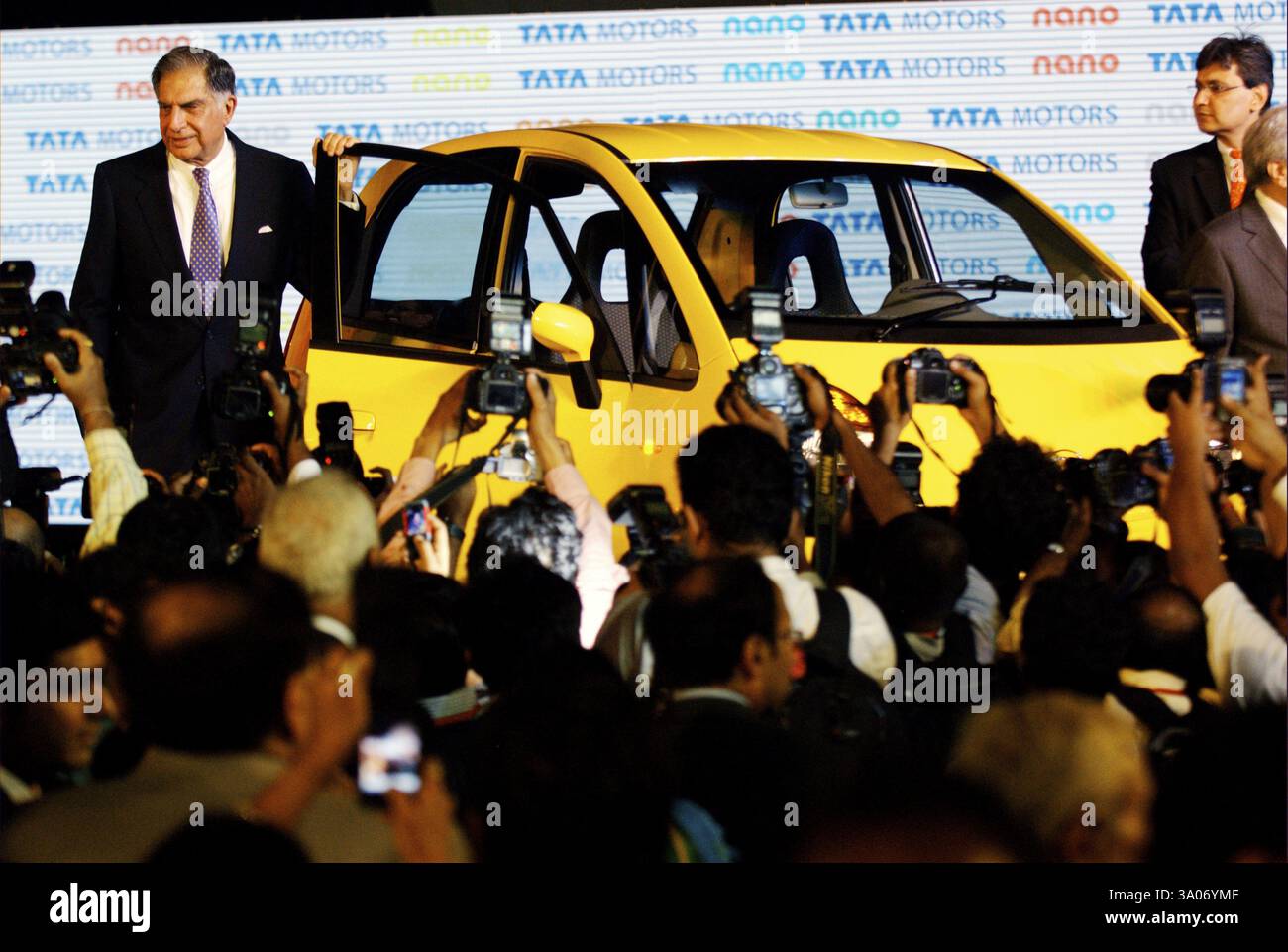 Ratan Tata Chairman Tata Group and Tata Motors with nano car and press ...