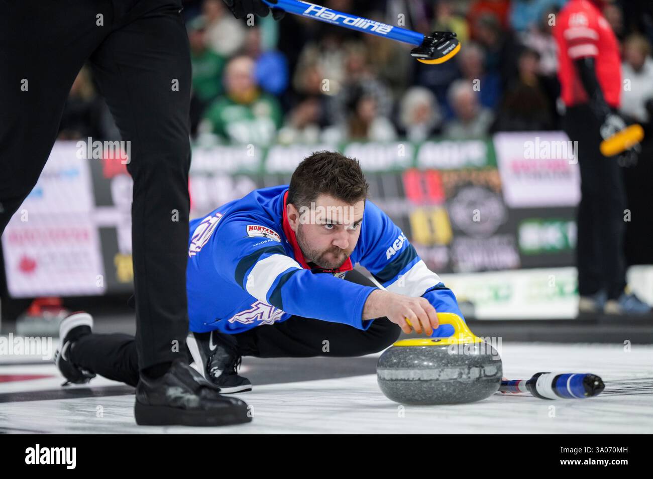 Manitoba-Dunstone skip Matt Dunstone delivers a rock while playing ...