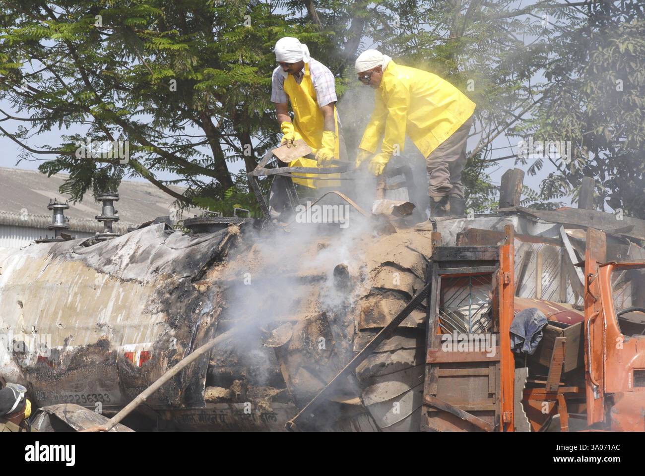 Fire department control chemical leak to prevent damage due to truck ...