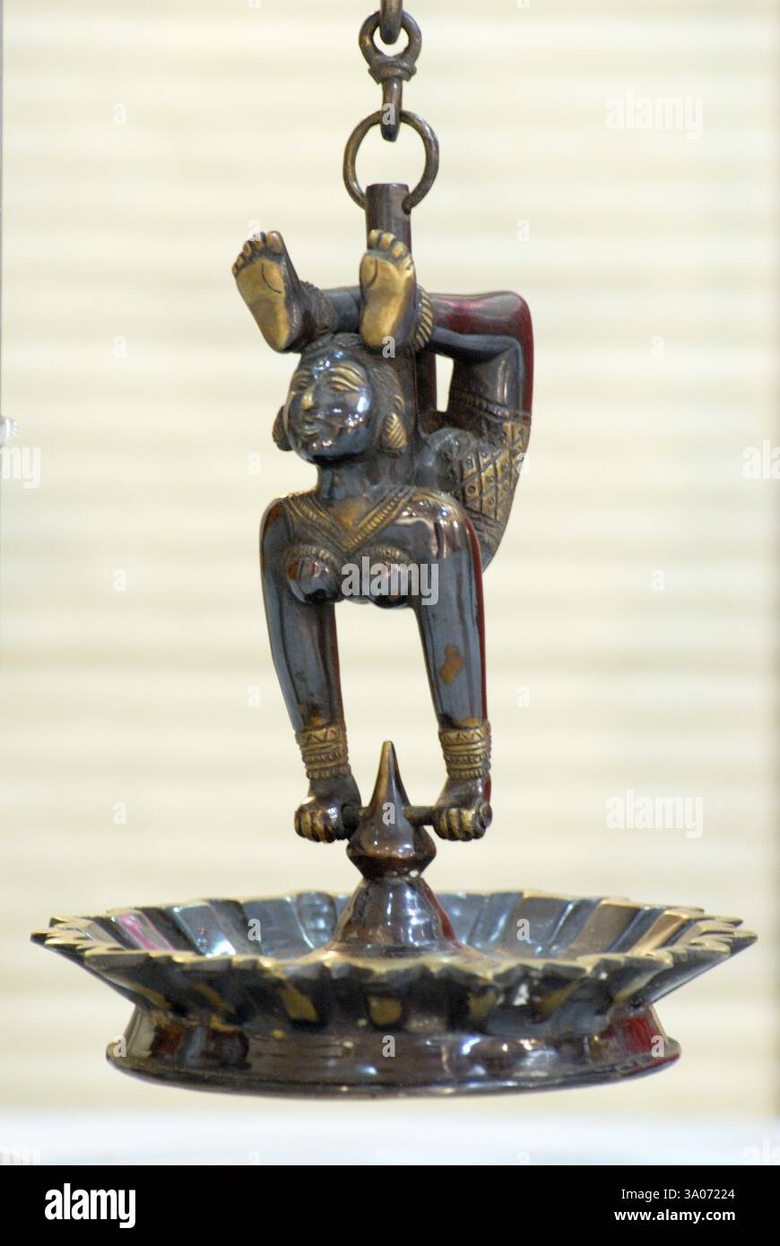Statue of women acrobat doing balancing act with body upside down pose ...