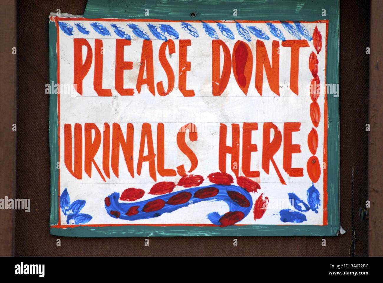 Colourfully painted board please don't urinals here at Kala Ghoda art ...