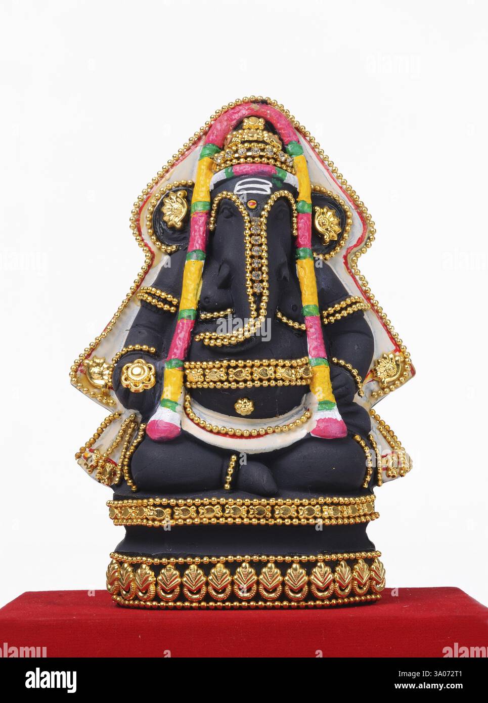 Red cloth on deity hi-res stock photography and images - Alamy