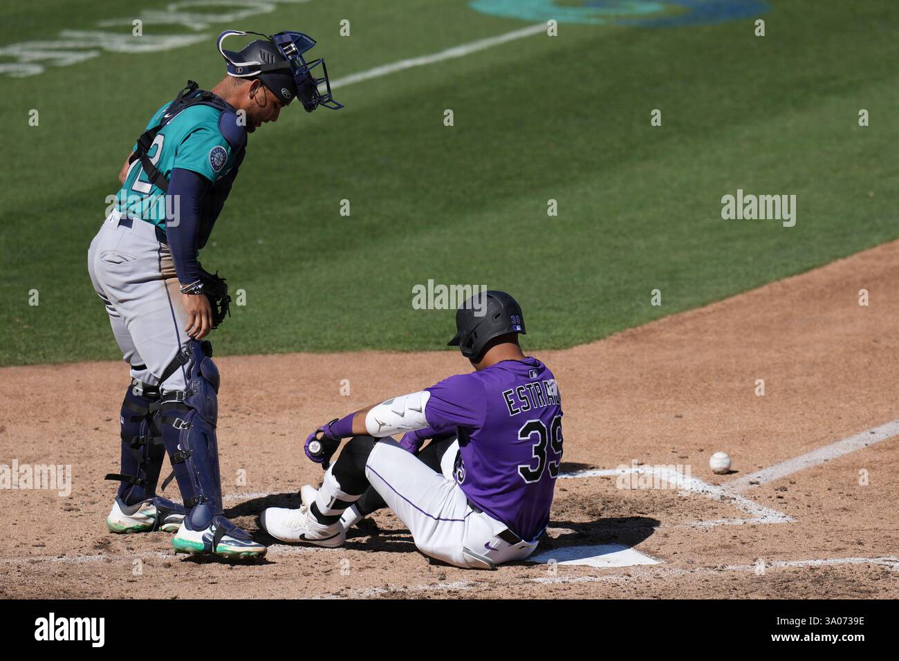 Colorado Rockies' Thairo Estrada (39) pauses on the ground after ...