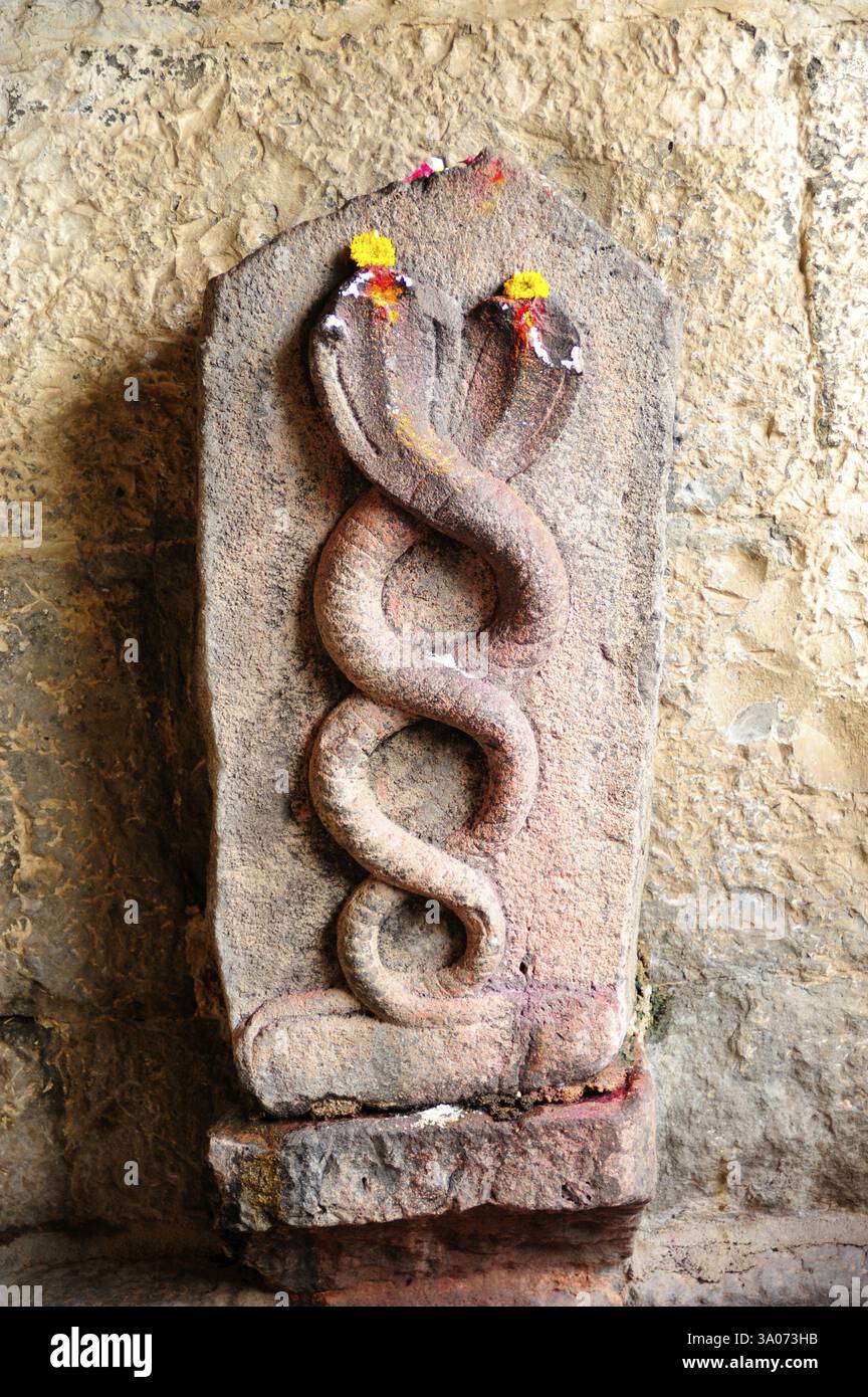 Snake in stone at velapur temple, Solapur, Maharashtra, India, Asia ...