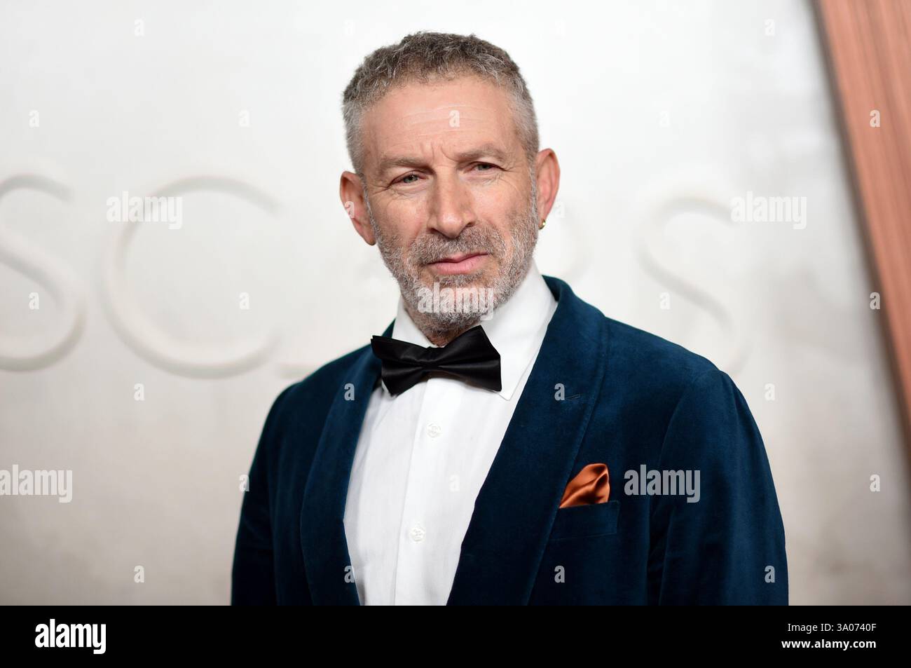 Mark Ivanir arrives at the Oscars on Sunday, March 2, 2025, at the ...