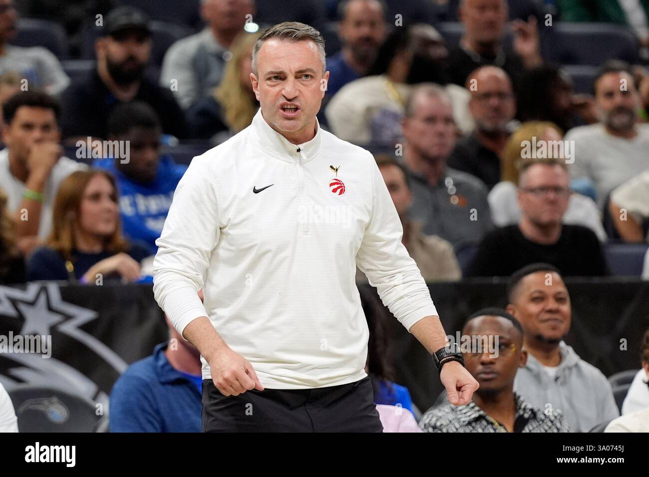 Toronto Raptors head coach Darko Rajakovic directs players on the court ...