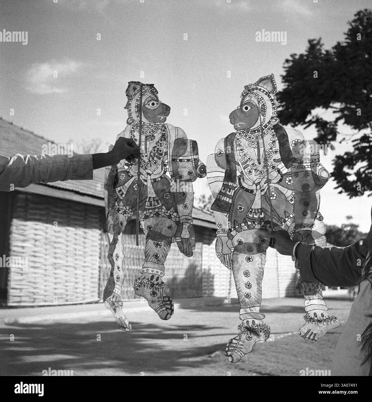 Displaying transparent painted leather puppets, Shadow puppet plays ...
