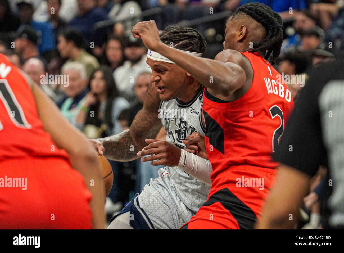 Orlando, Florida, USA, March 2, 2025, Orlando Magic forward Palo Banchero #5 attempt to run pass ...