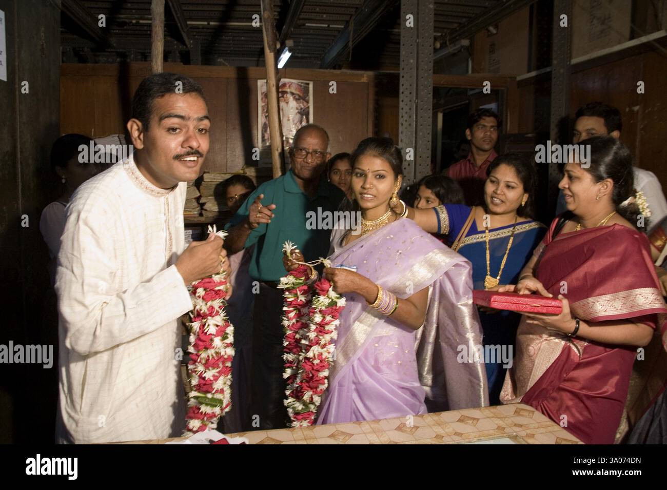 Bride and Bridegroom Holding Garland performing Vidhi in Court marriage ...