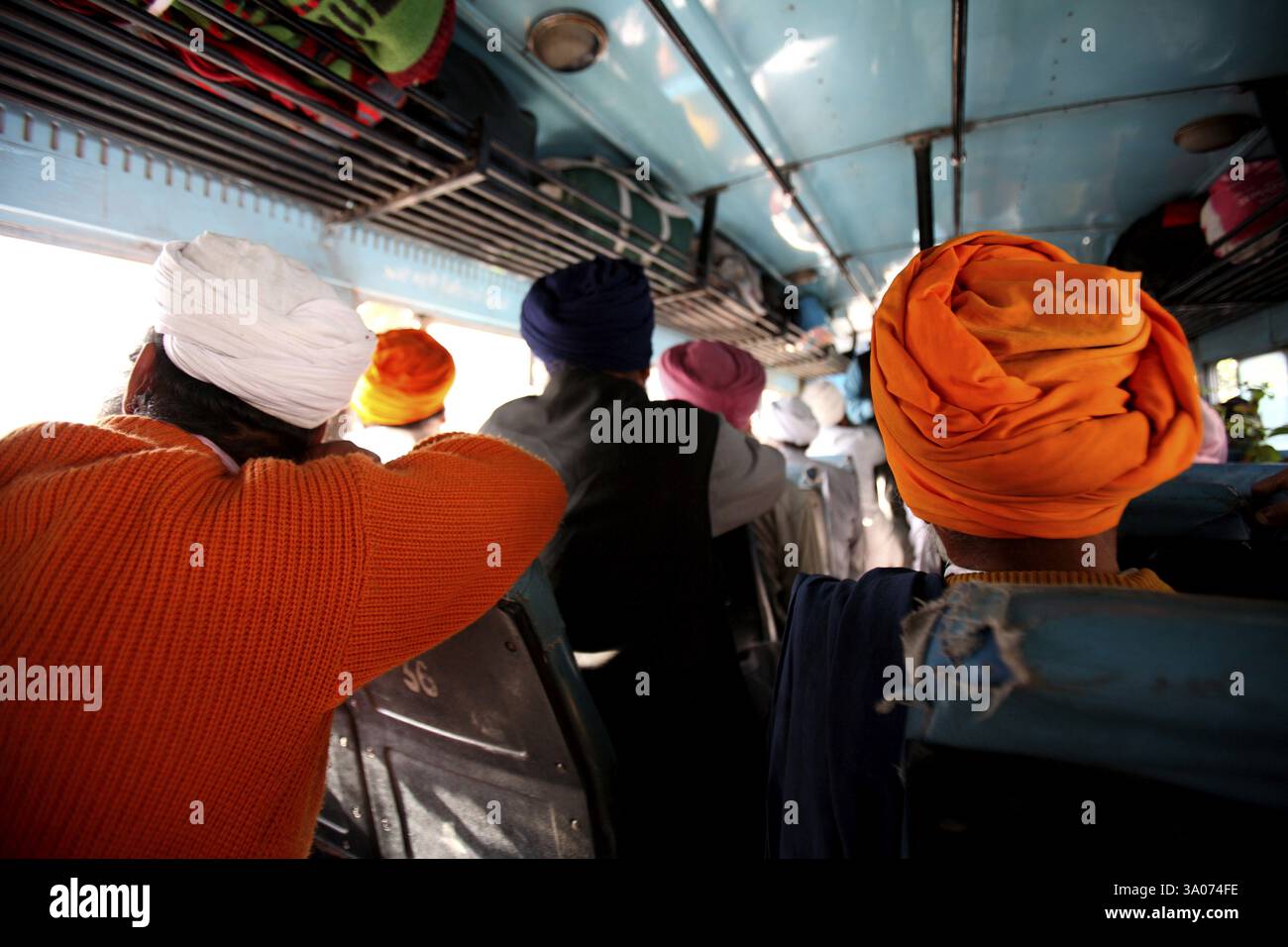 People sitting inside bus in Punjab, India, Asia Stock Photo - Alamy