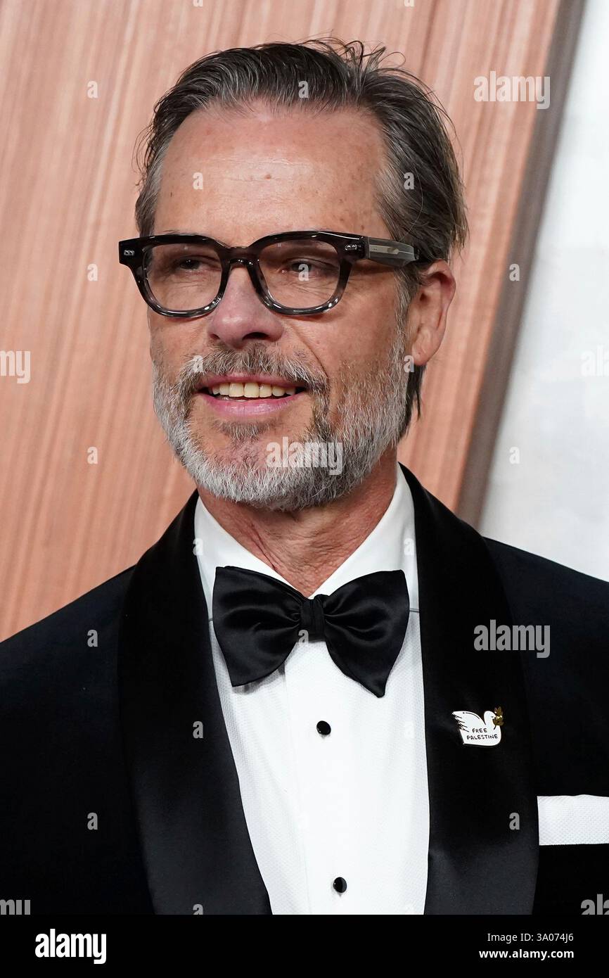 Guy Pearce arrives at the Oscars on Sunday, March 2, 2025, at the Dolby ...