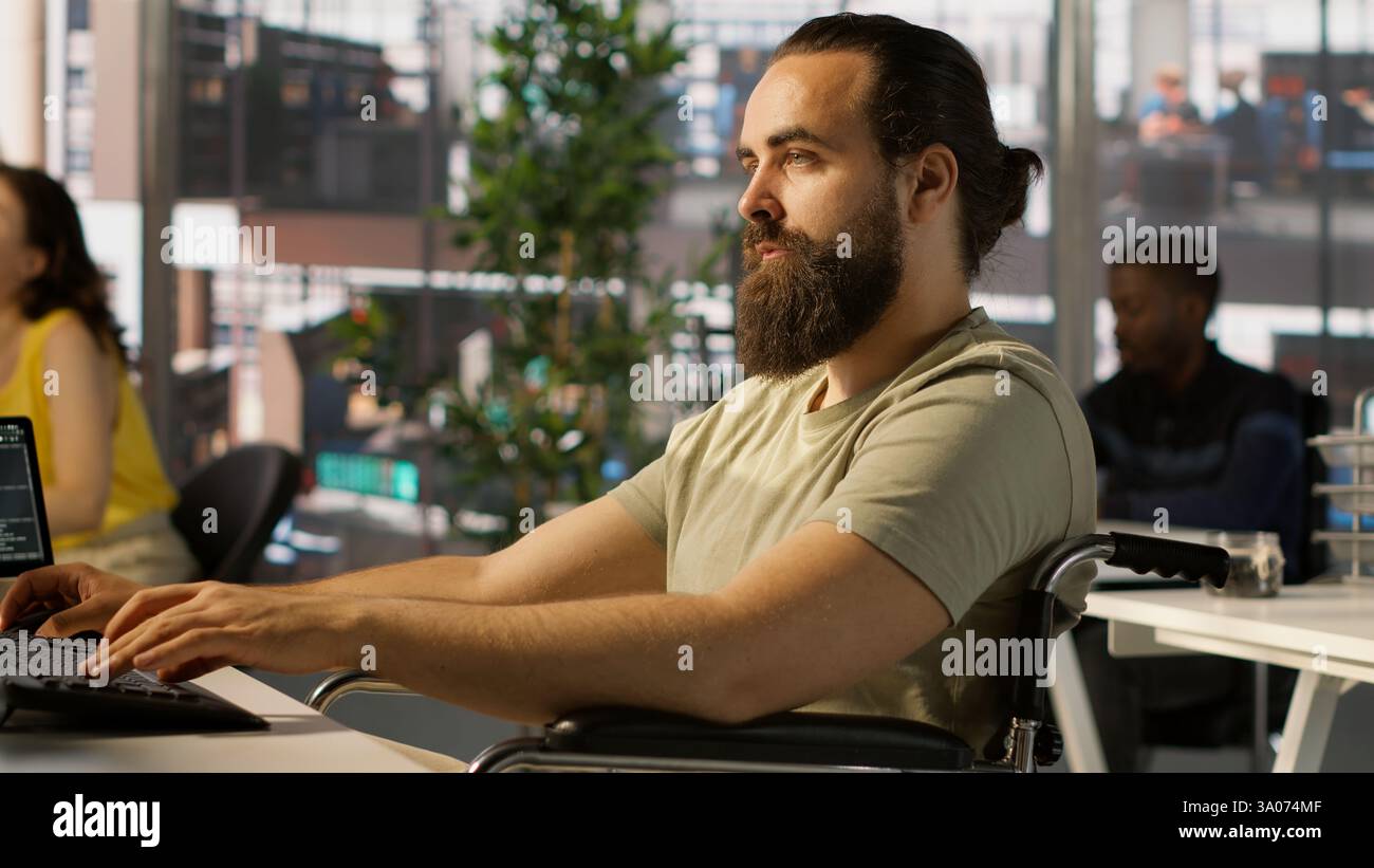 System administrator with disability in inclusive workspace training ...