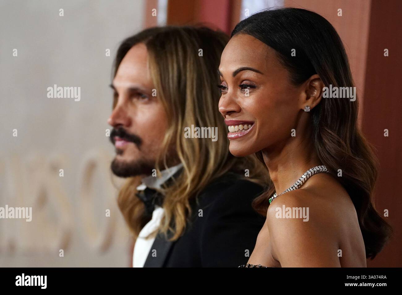 Marco Perego Saldana, left, and Zoe Saldana arrive at the Oscars on ...