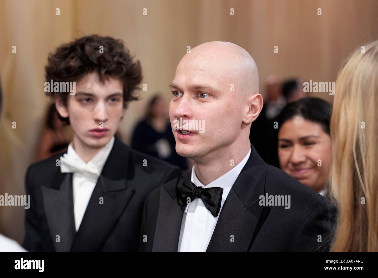 Mark Eydelshteyn, left, and Yura Borisov arrive at the Oscars on Sunday, March 2, 2025, at the ...