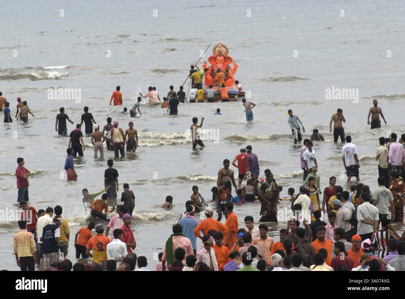 People carrying lord ganesh for immersion at beach, Dadar, Bombay ...