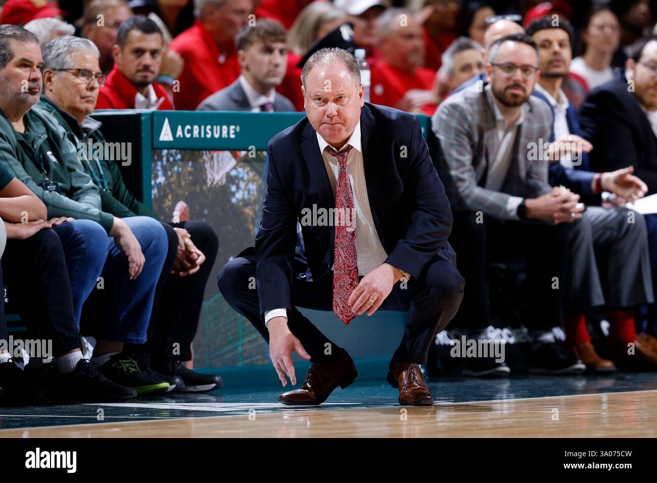 Wisconsin coach Greg Gard watches during an NCAA college basketball ...