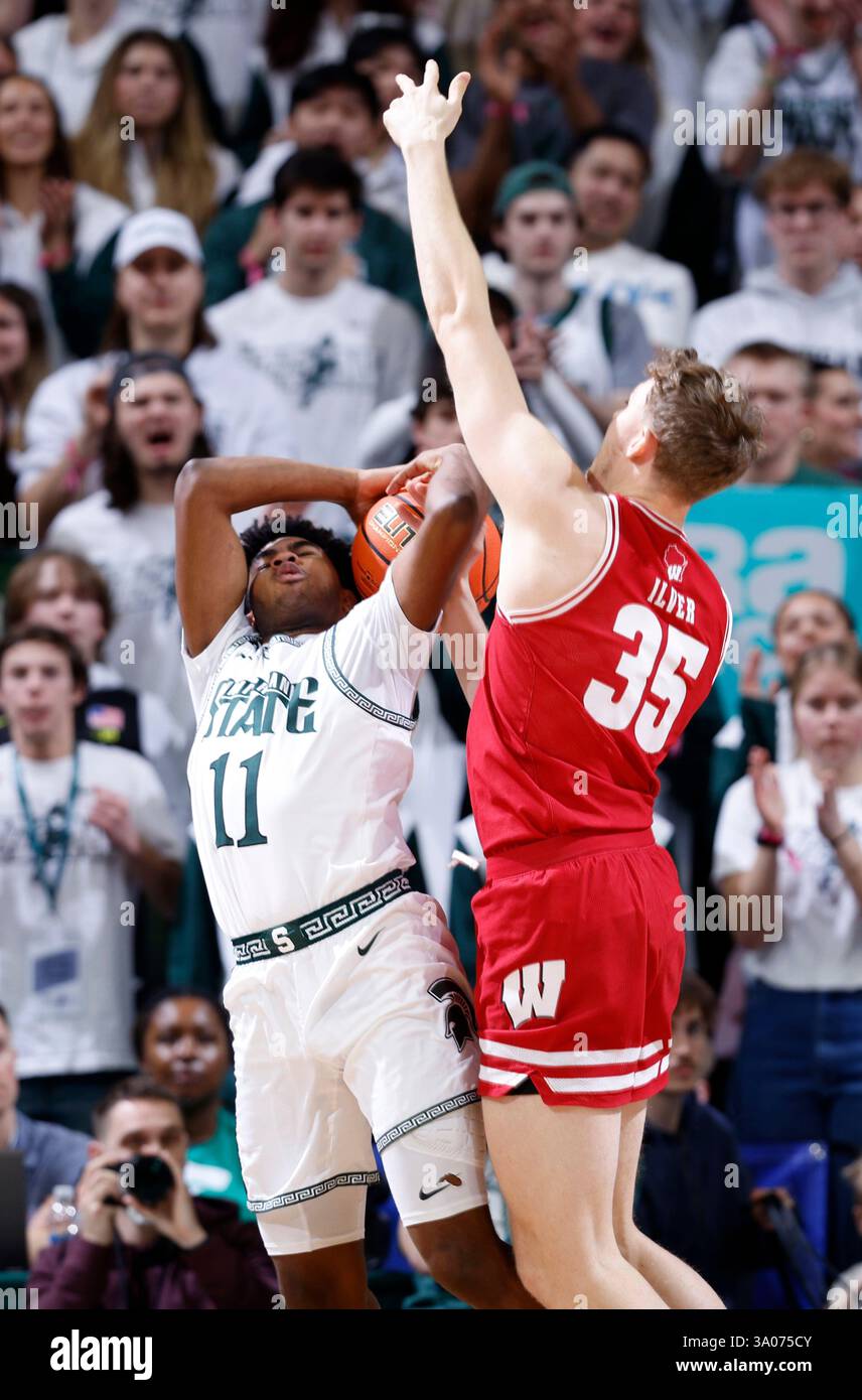 Michigan State guard Jase Richardson (11), left, and Wisconsin forward ...