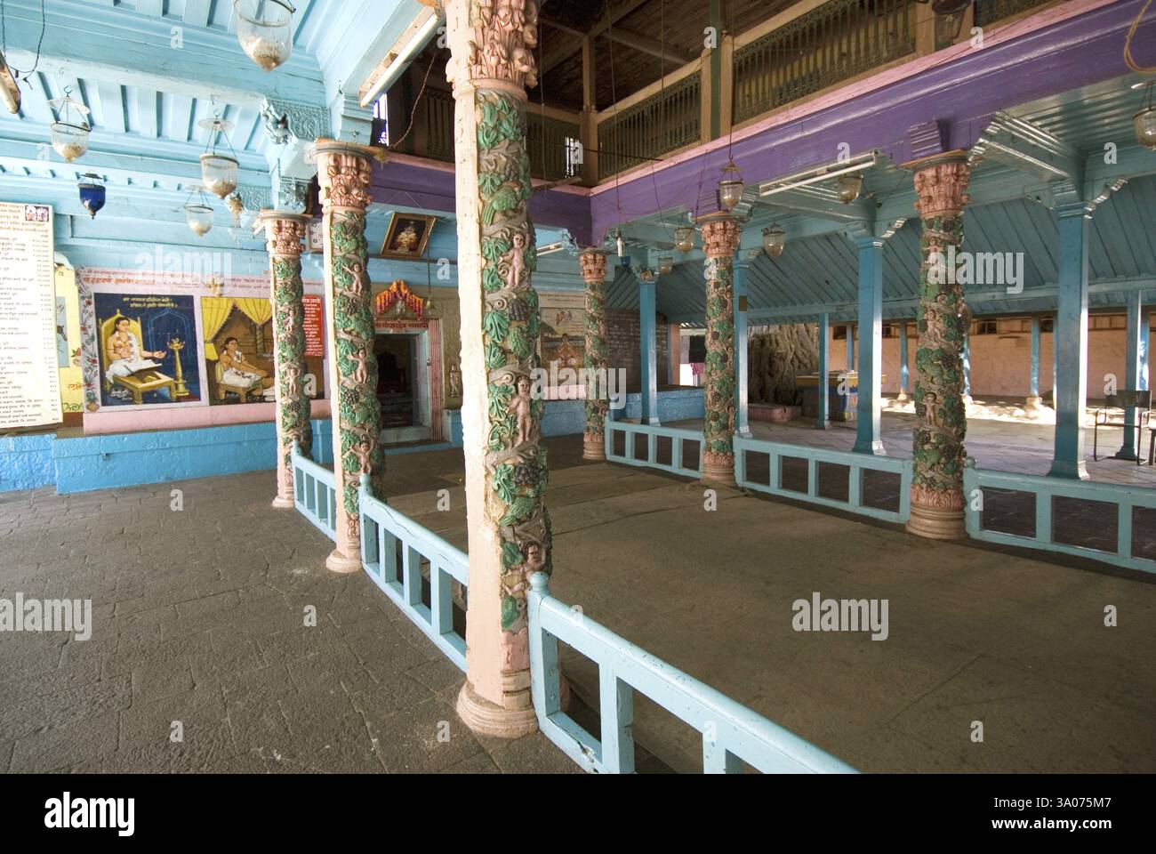 Inside view, carved and painted wooden pillars at Sopandev tomb temple ...