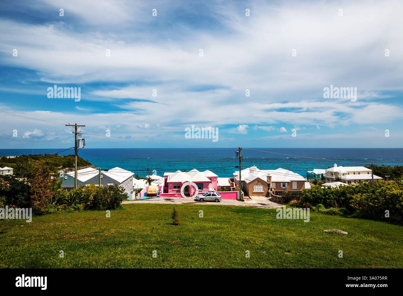 Typical Bermuda residential houses with stepped white limestone roofs ...