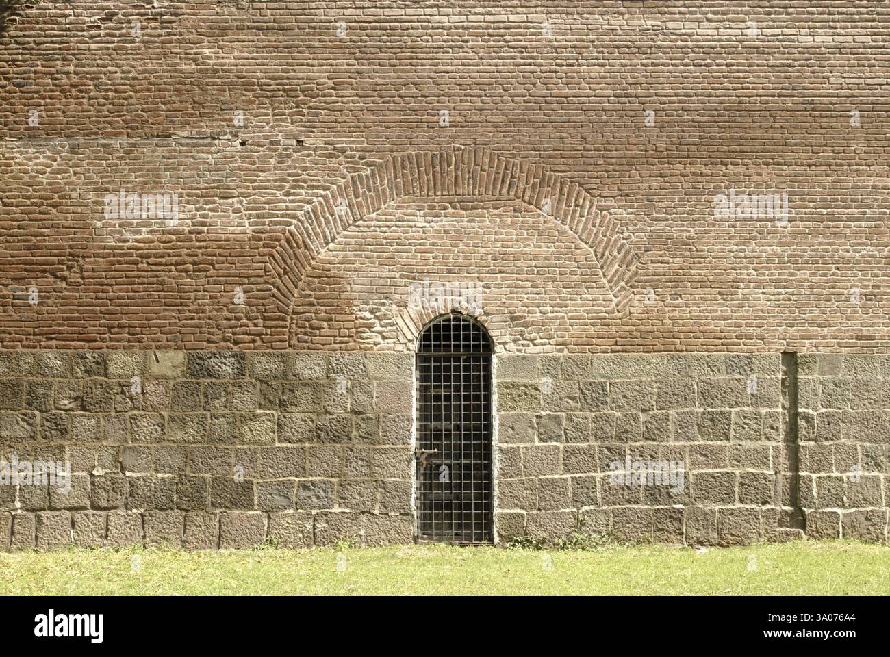 Fortification by coursed rubble masonry and brickwork wall of ...