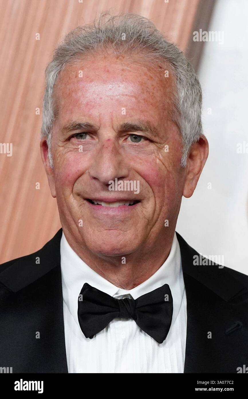 Marc Platt arrives at the Oscars on Sunday, March 2, 2025, at the Dolby ...