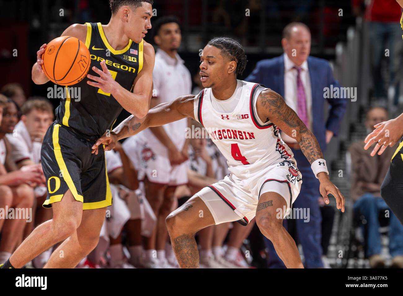Wisconsin Badgers guard Kamari McGee (4) defends during a Big Ten ...