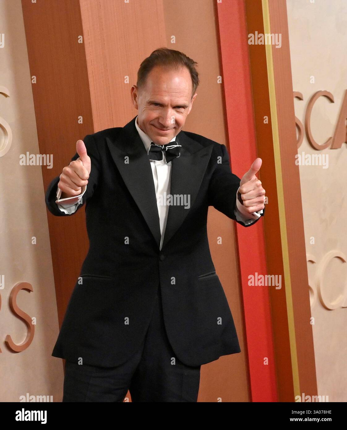Ralph Fiennes arrives on the red carpet for the 97th Academy Awards in ...