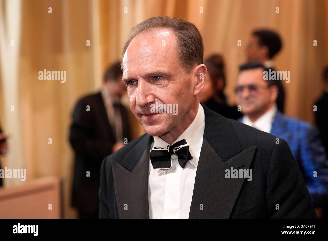 Ralph Fiennes arrives at the Oscars on Sunday, March 2, 2025, at the ...