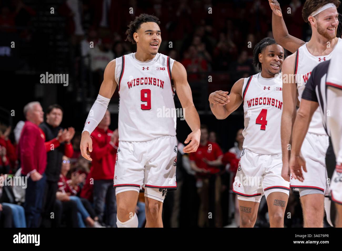 Wisconsin Badgers guard John Tonje (9) looks on during an NCAA college ...