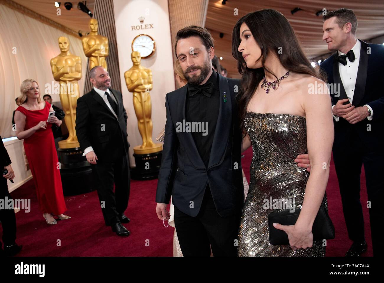 Kieran Culkin, left, and Jazz Charton arrive at the Oscars on Sunday ...