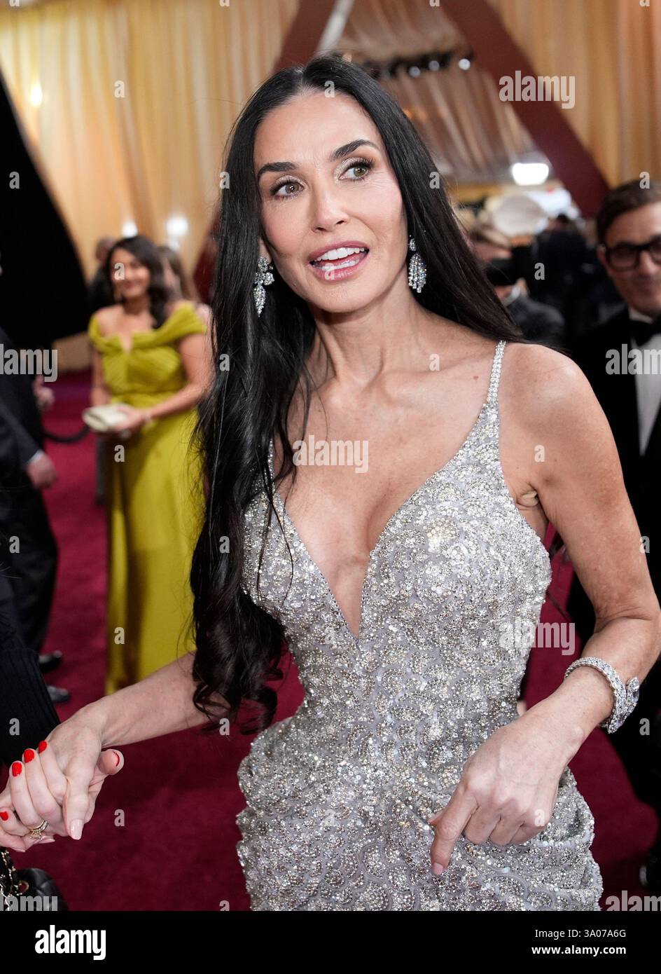 Demi Moore arrives at the Oscars on Sunday, March 2, 2025, at the Dolby Theatre in Los Angeles ...