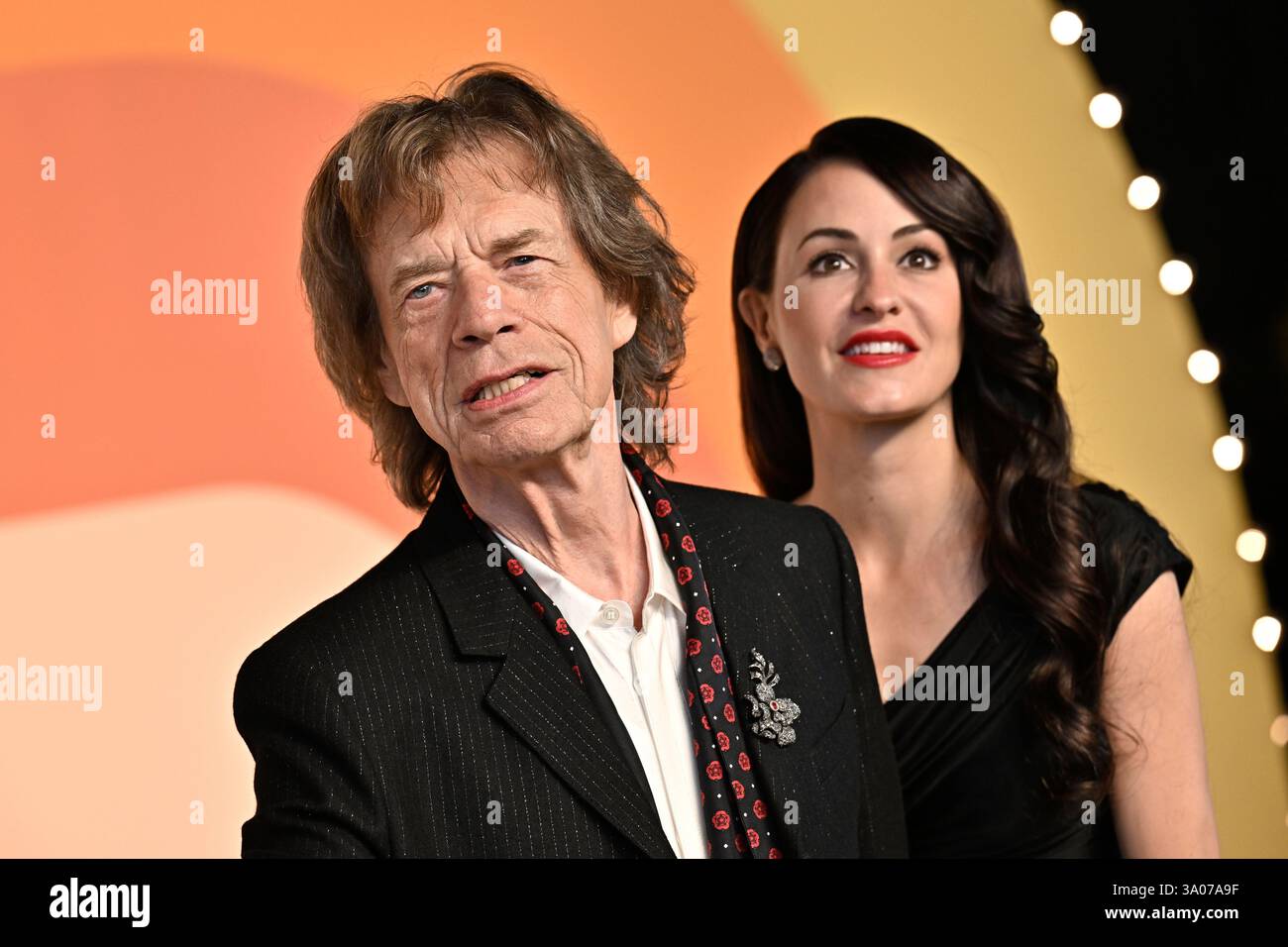 Mick Jagger and Melanie Hamrick arrive at the Vanity Fair Oscar Party ...
