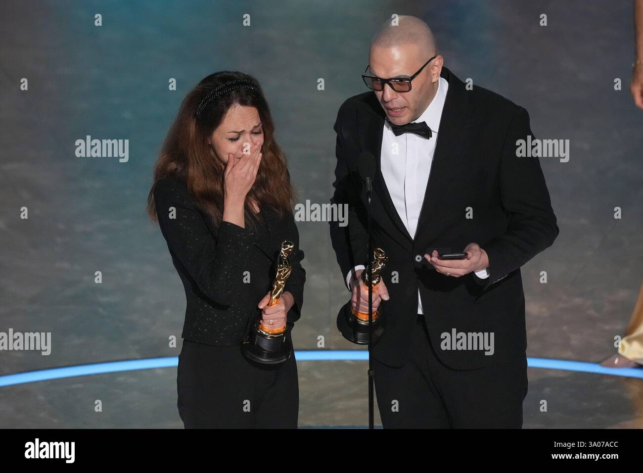 Shirin Sohani, left, and Hossein Molayemi accept the award for best ...