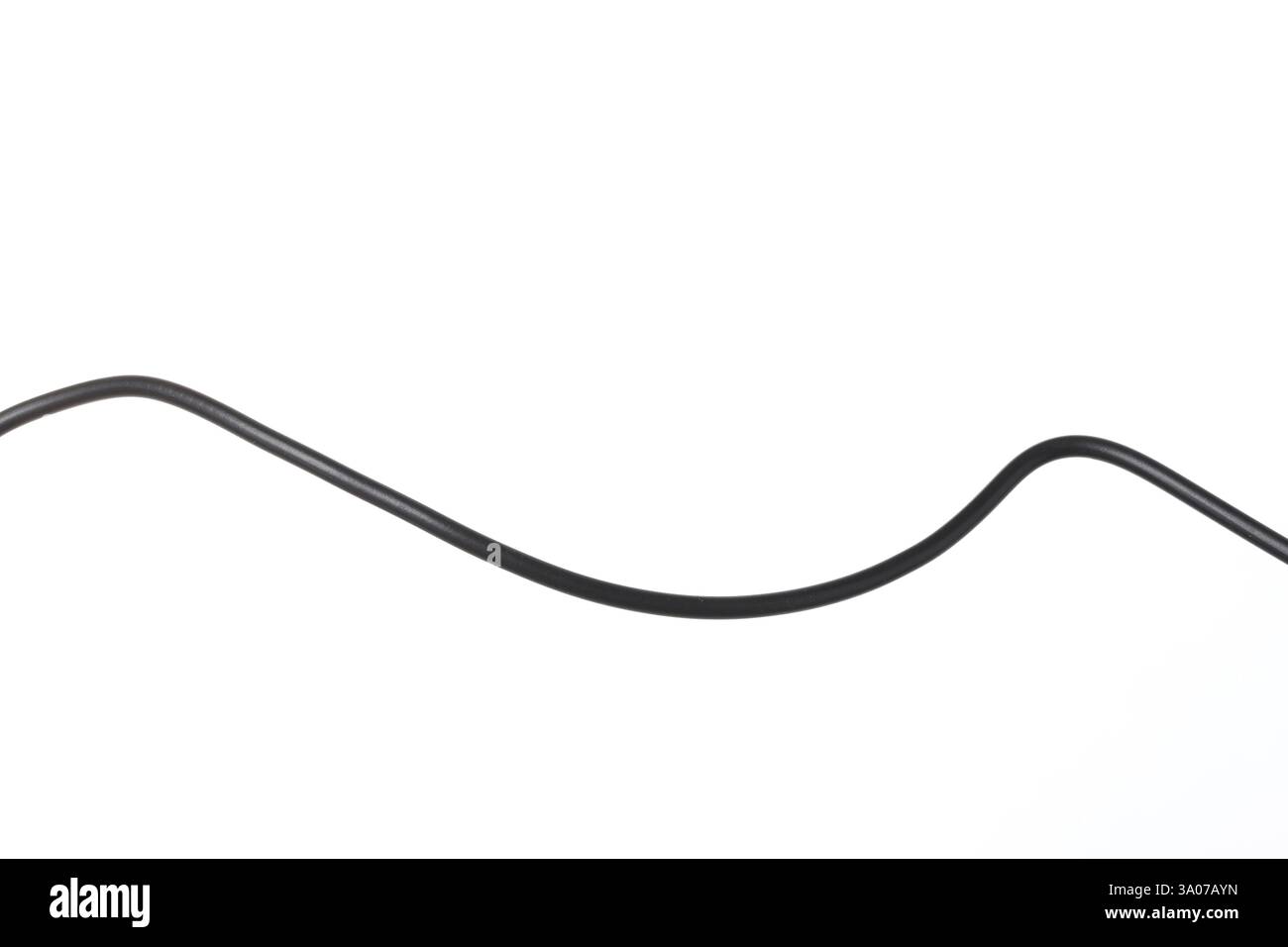 One black electrical wire on white background Stock Photo - Alamy