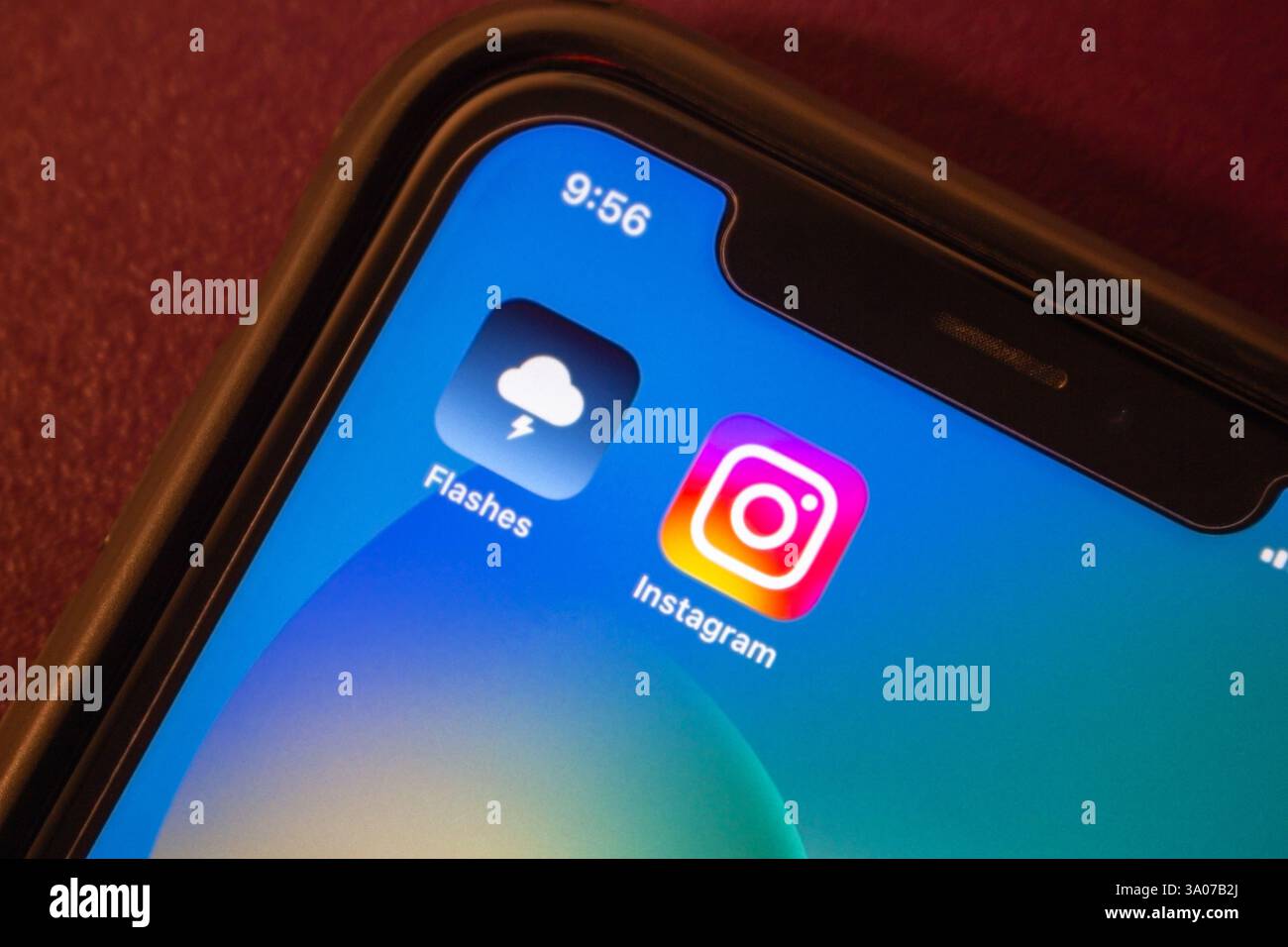 Flashes and Instagram logos are shown on an iPhone. Flashes app is a ...