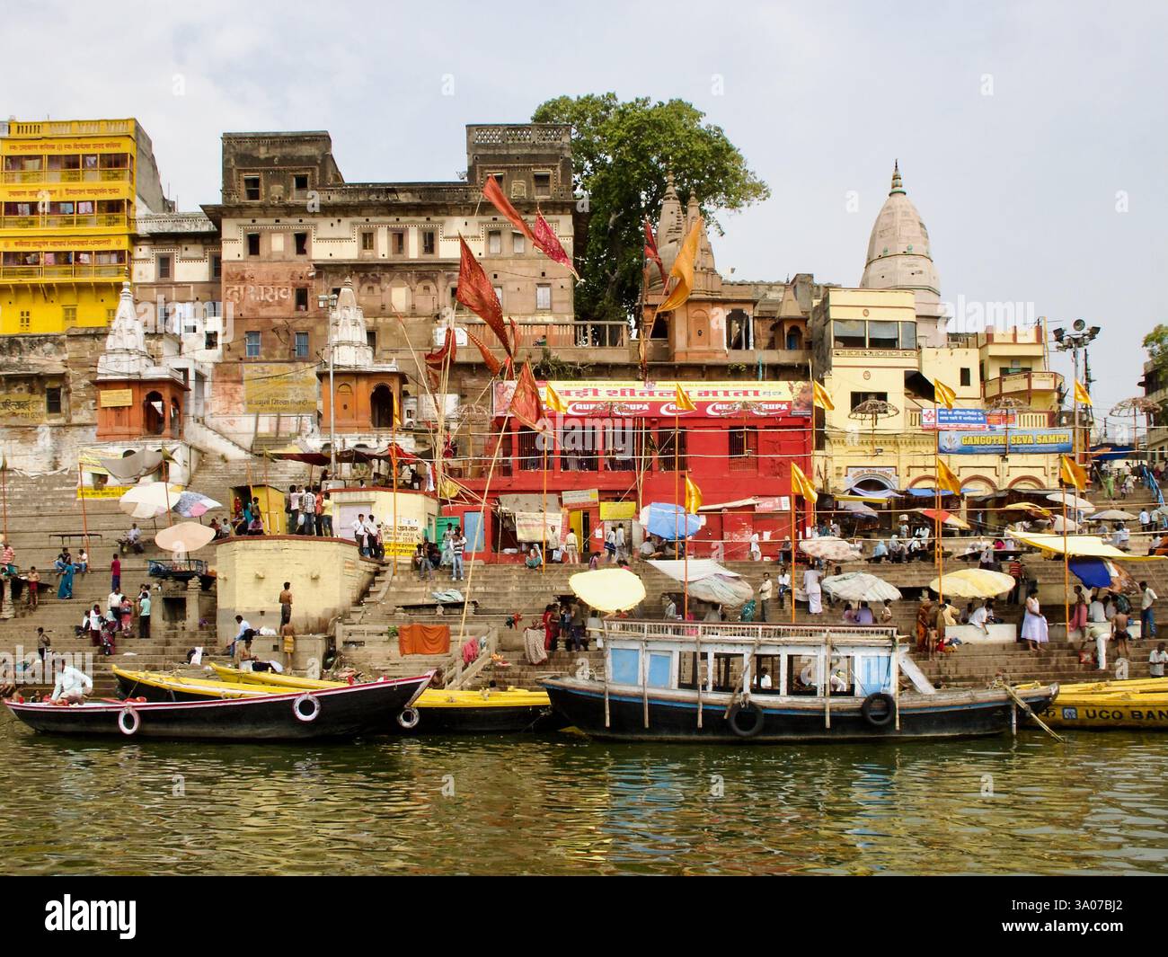 Ahilyabai Ghat in Varanasi, a bustling riverside location with temples ...