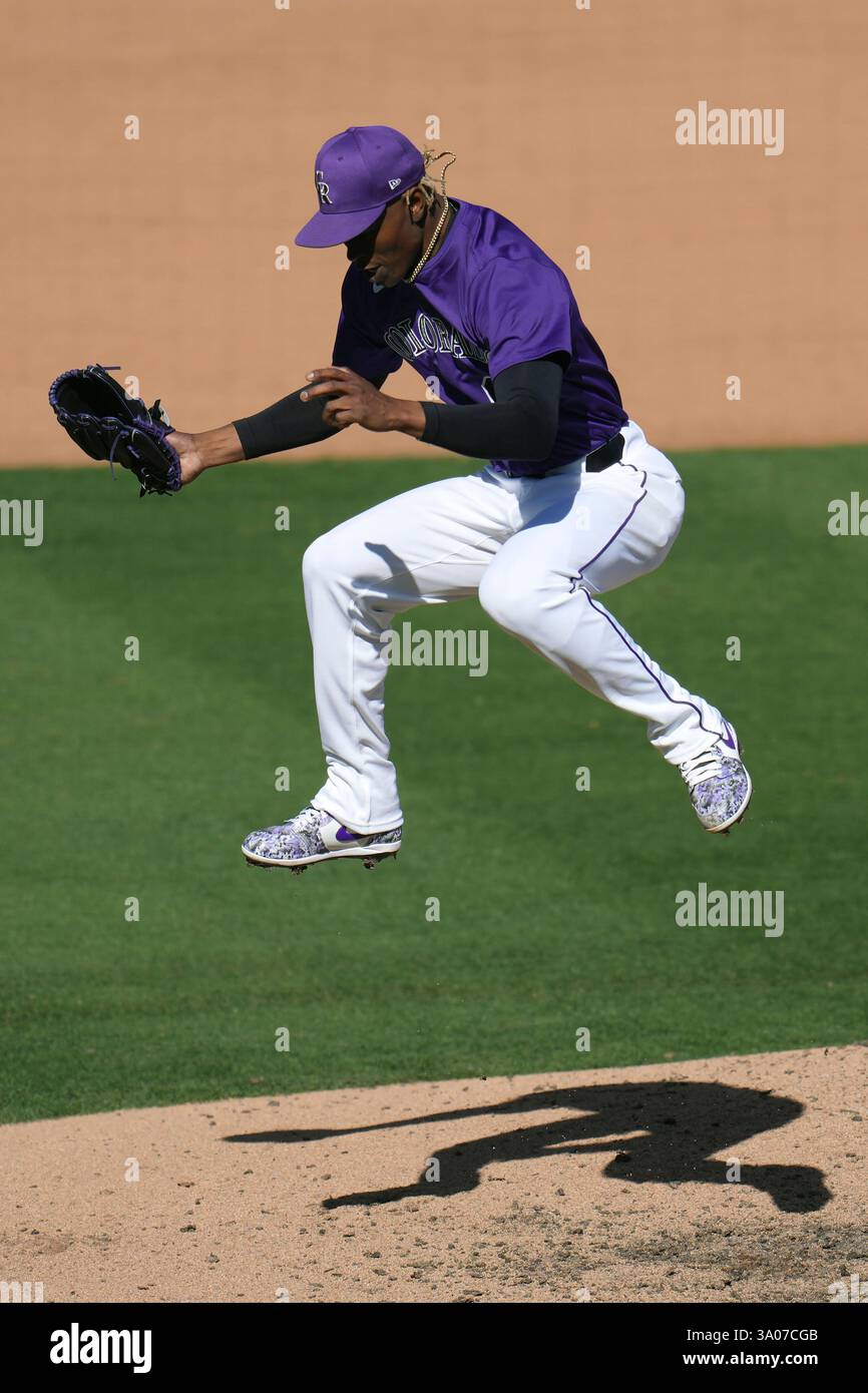 Colorado Rockies pitcher Jefry Yan celebrates a strikeout against ...
