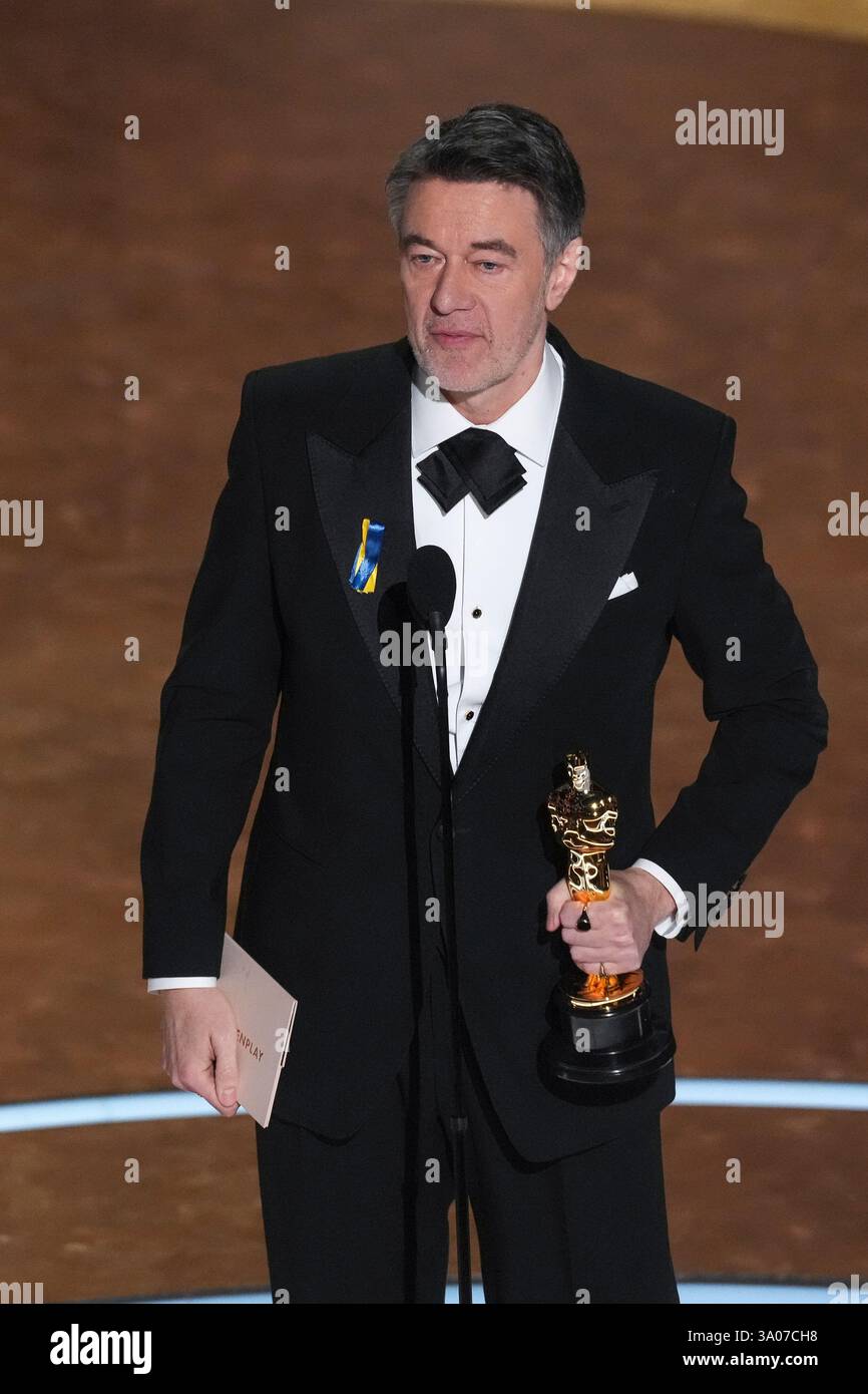 Peter Straughan accepts the award for best adapted screenplay for ...