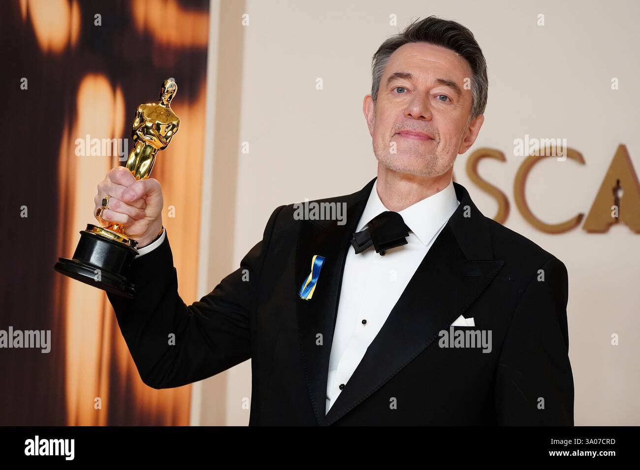 Peter Straughan, winner of the award for best adapted screenplay for ...