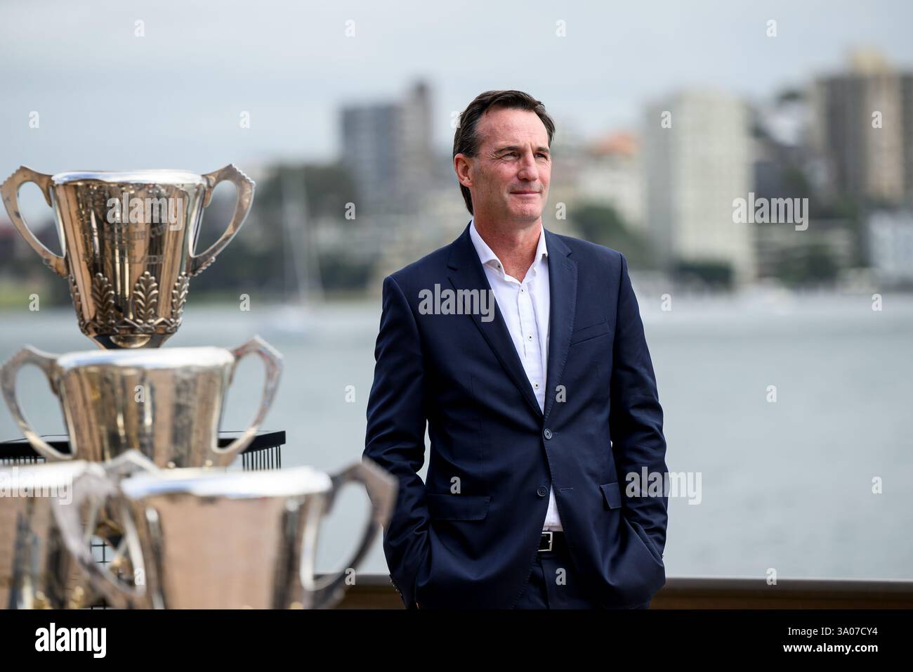 AFL CEO Andrew Dillon poses for a photograph with the AFL Championship ...