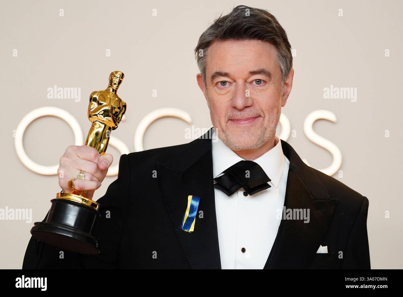 Peter Straughan, winner of the award for best adapted screenplay for ...