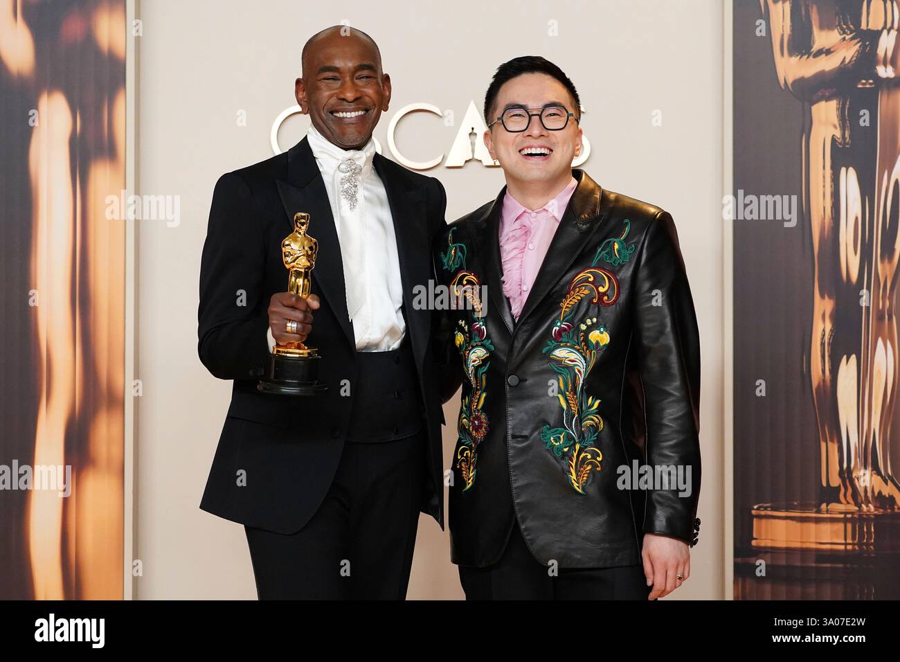 Paul Tazewell, left, winner of the award for best costume design for "Wicked," poses in the ...