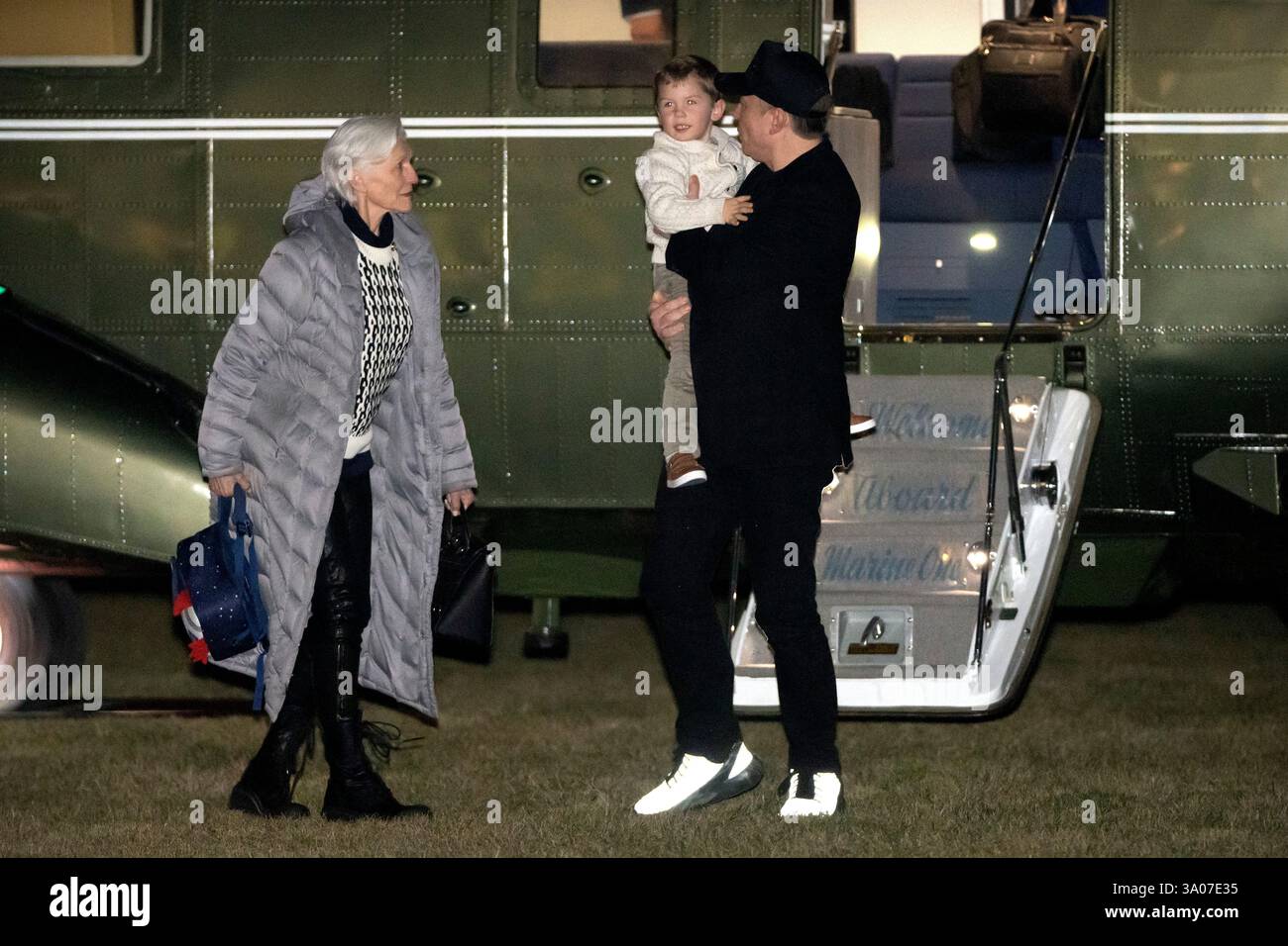 Elon Musk, right, his son X Æ A-Xii, and his mother Maye Musk step off ...