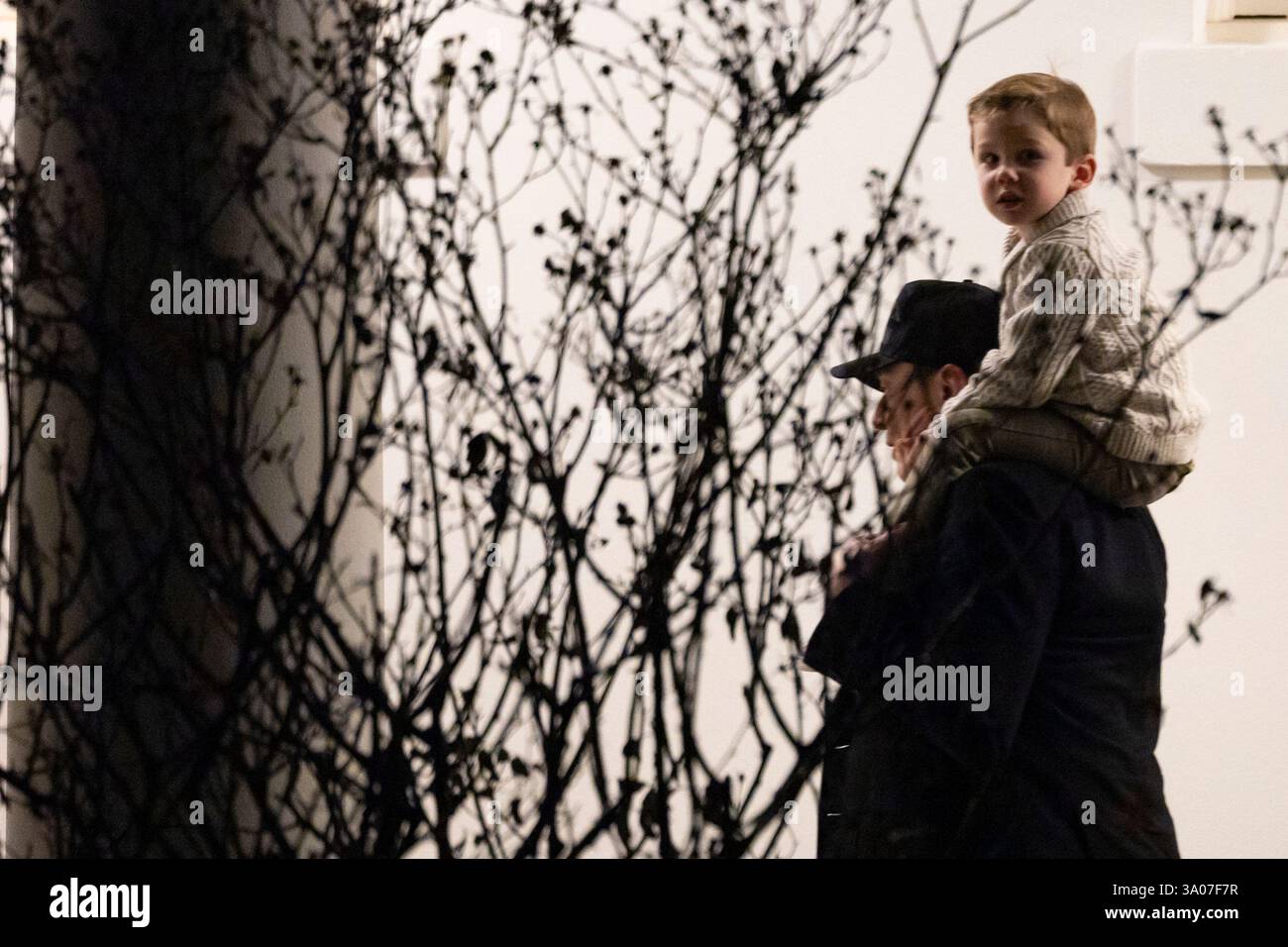 WASHINGTON – March 2, 2025: Elon Musk holds X Æ A-12 Musk as they walk ...