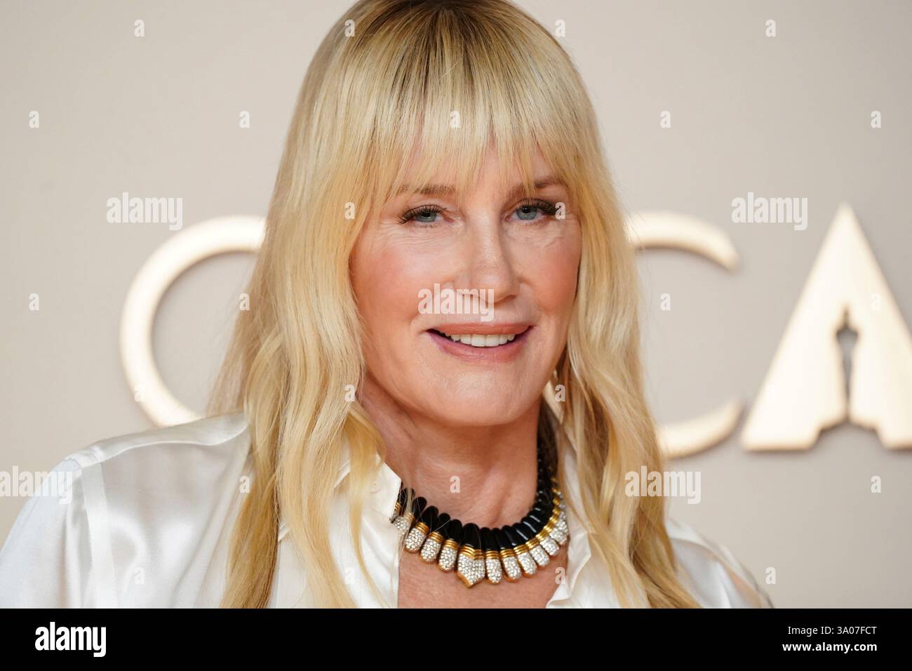 Daryl Hannah poses in the press room at the Oscars on Sunday, March 2, 2025, at the Dolby ...