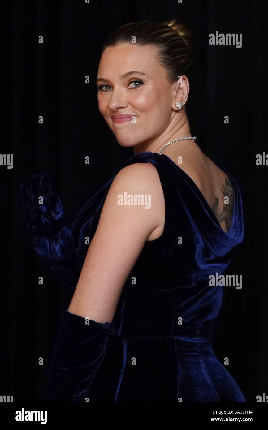 Scarlett Johansson poses in the press room at the Oscars on Sunday, March 2, 2025, at the Dolby ...