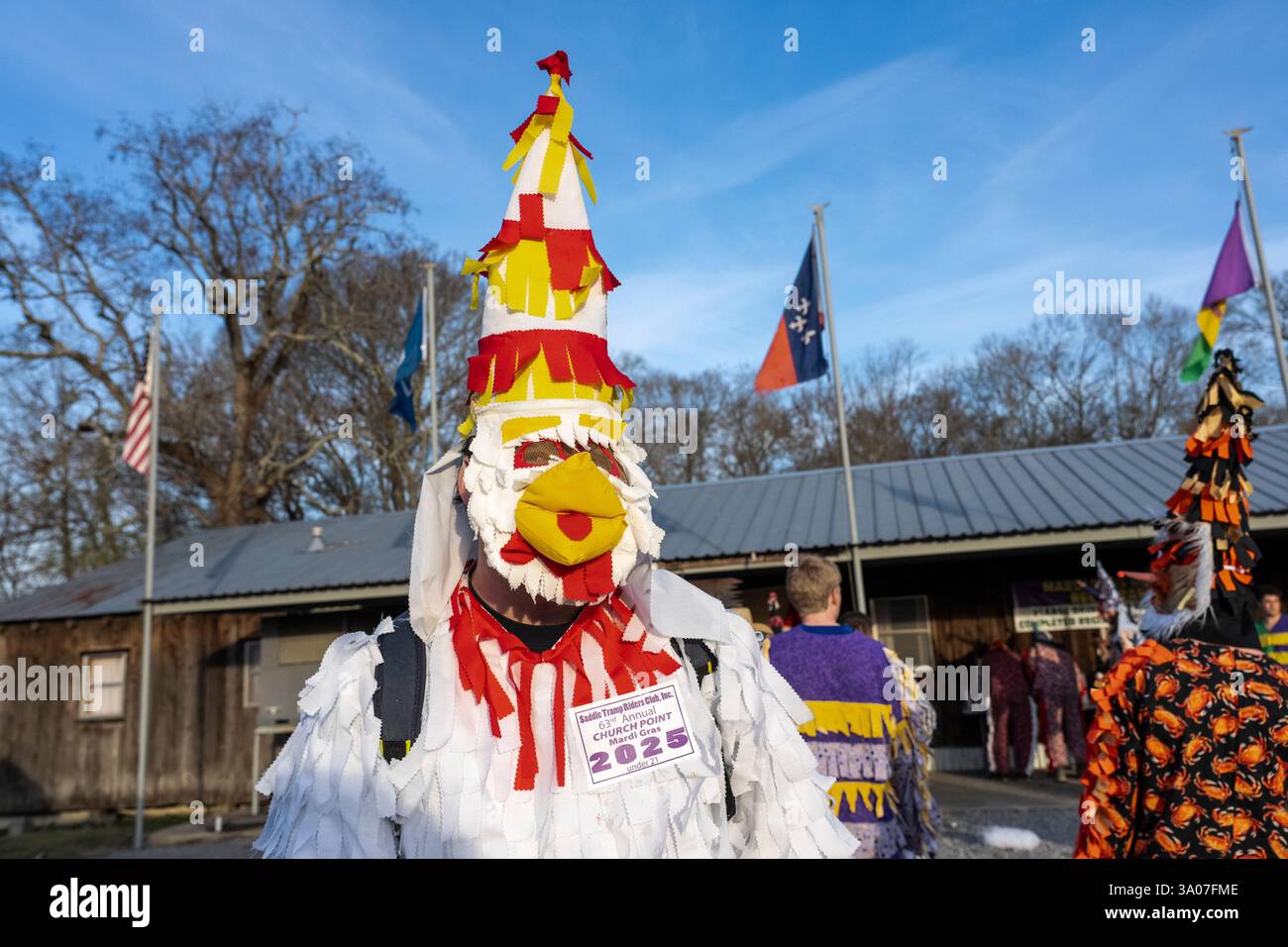 Parade participants are seen during the Church Point Courir de Mardi ...