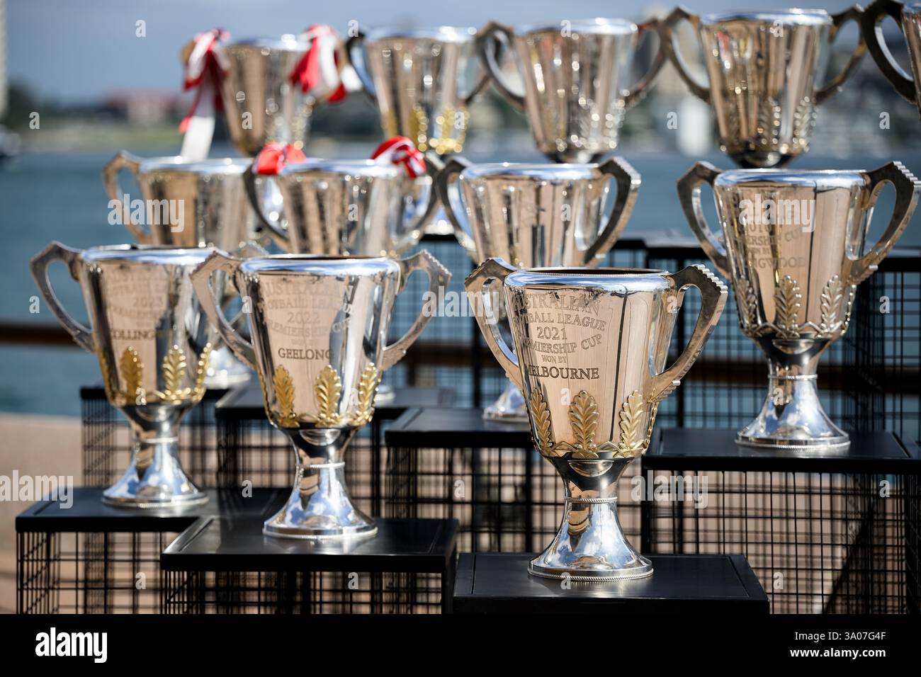 AFL Championship trophies from various years are displayed during the ...