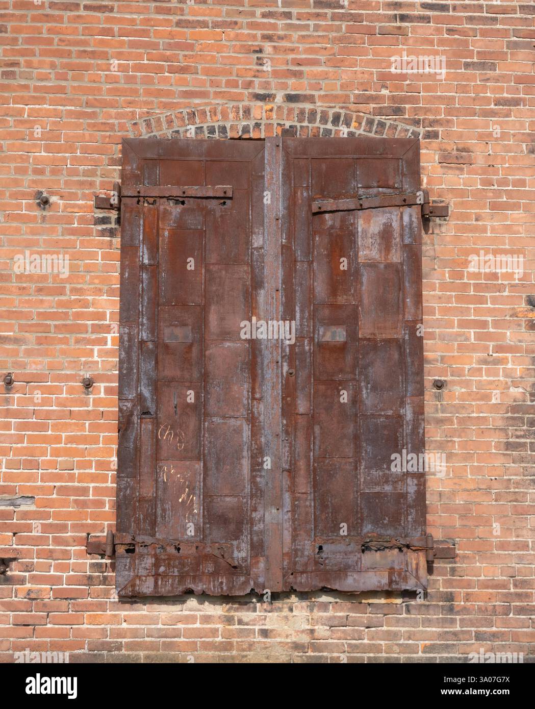 Old, metal shutters with worn hinges in a brick wall Stock Photo - Alamy