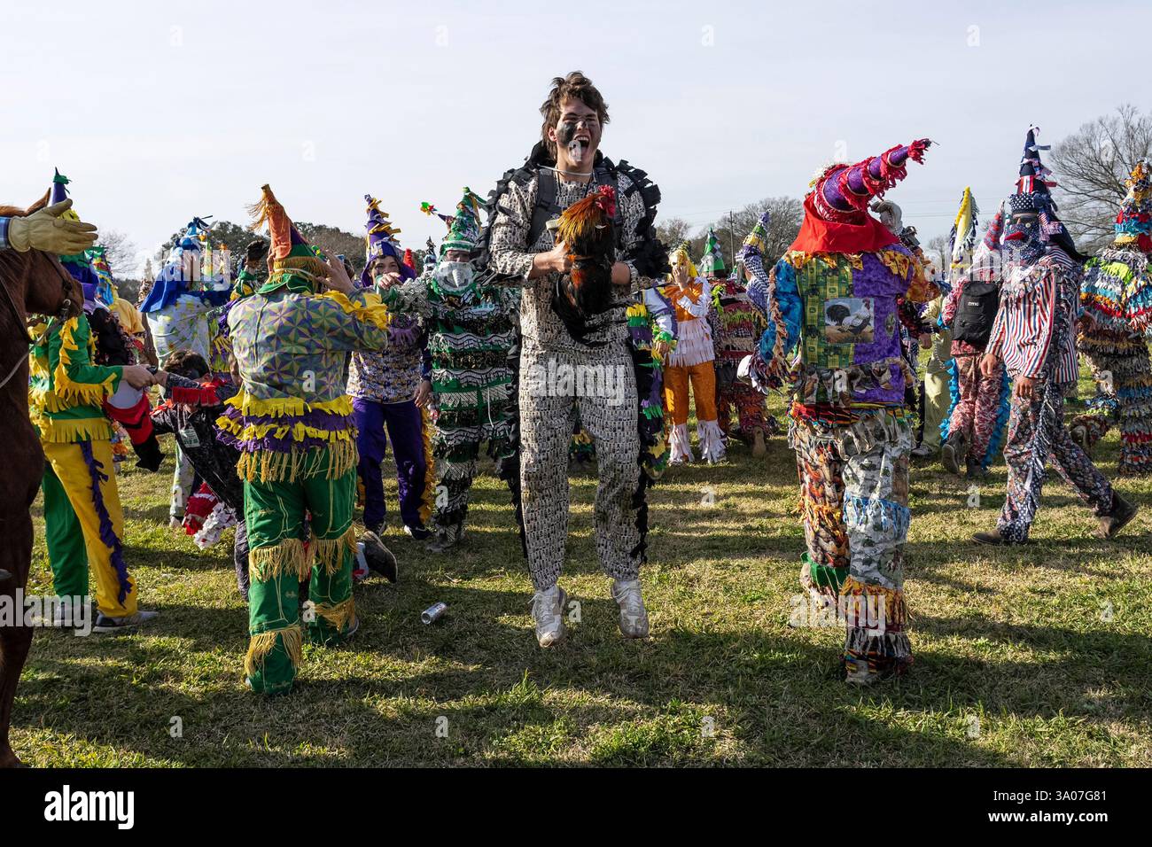 Parade participants are seen during the Church Point Courir de Mardi ...